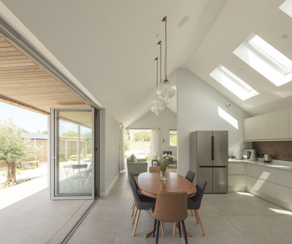 A light-filled coastal home transformed with Schüco bi-fold doors ...