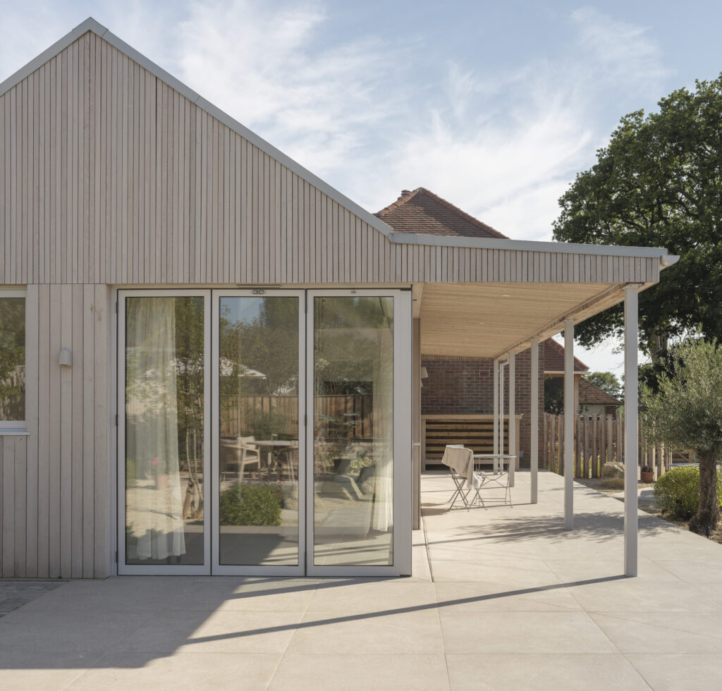 A light-filled coastal home transformed with Schüco bi-fold doors ...